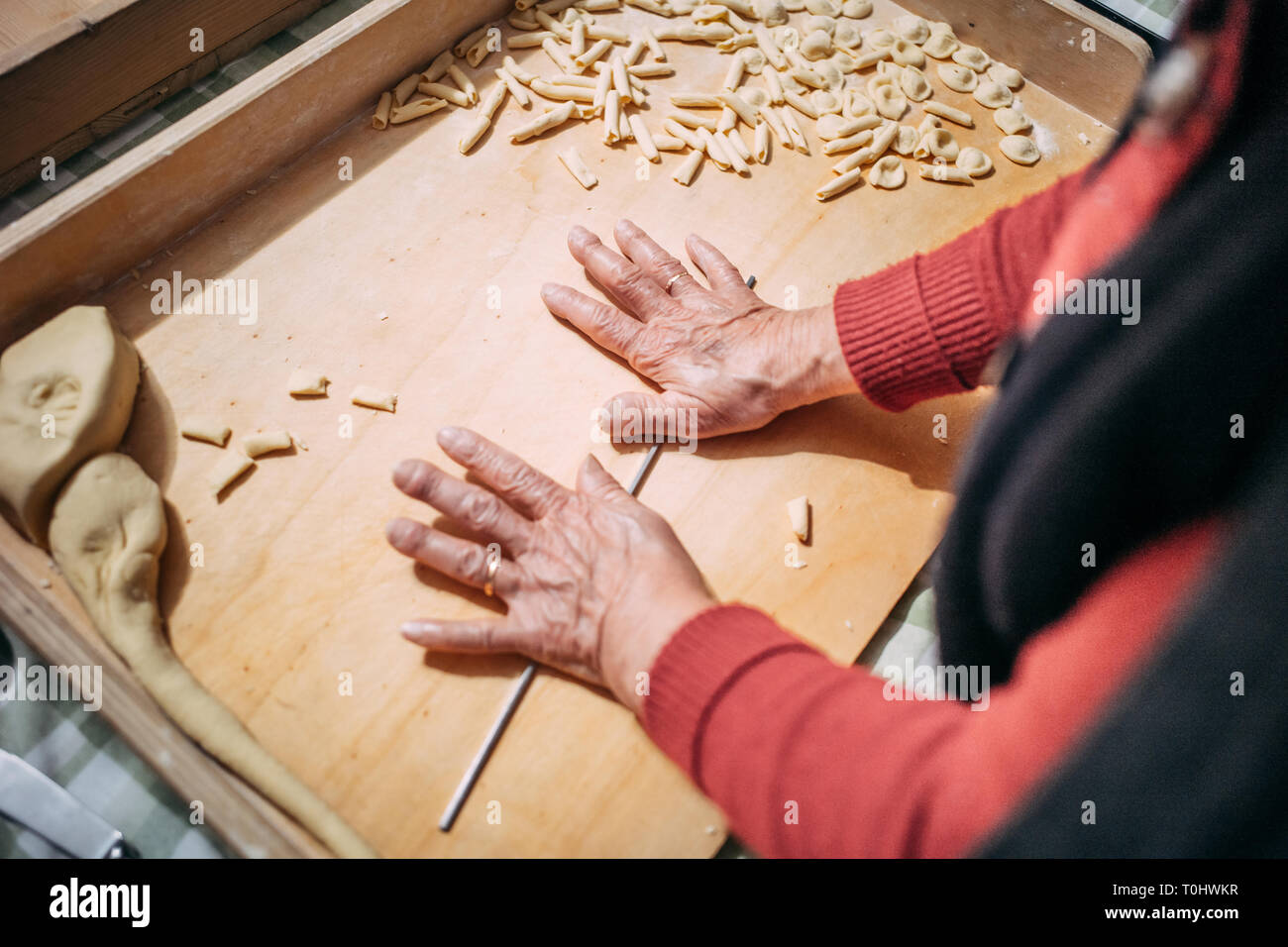 The making of Italian traditional pasta Stock Photo - Alamy