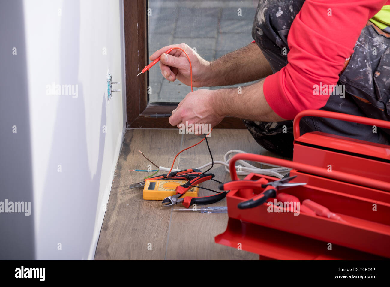 hands of an electrician at work Stock Photo - Alamy