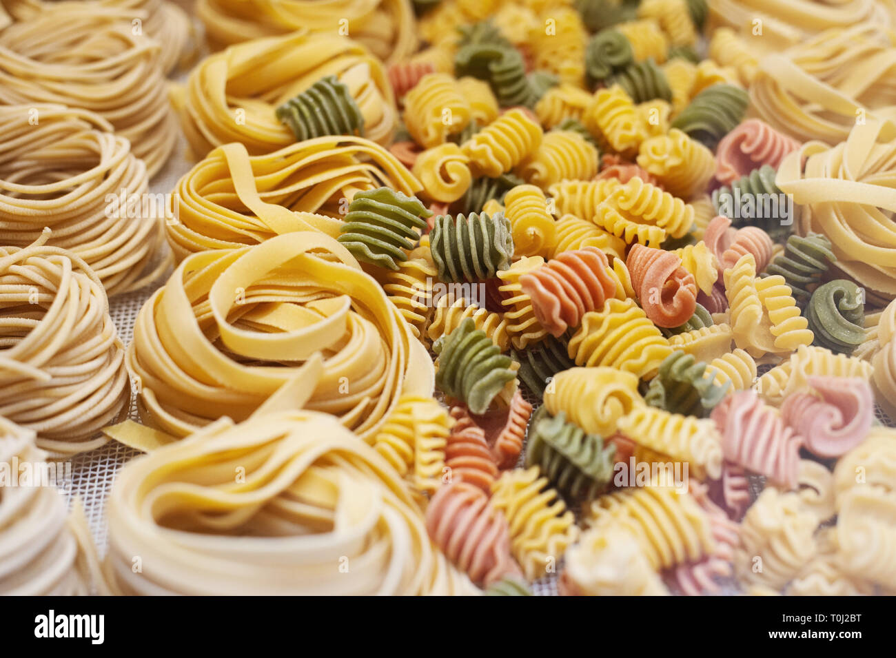 italian spaghetti homemade and other size fresh pasta Stock Photo - Alamy