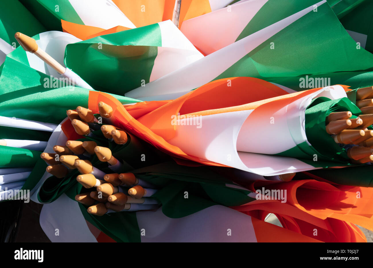 Irish green, white and orange coloured national flags are for sale in ...