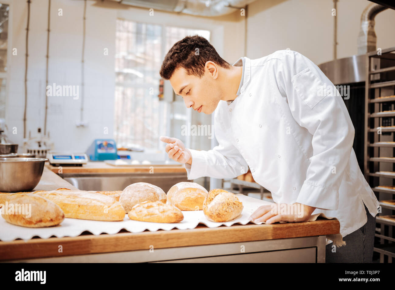 Man smelling bread hi-res stock photography and images - Alamy