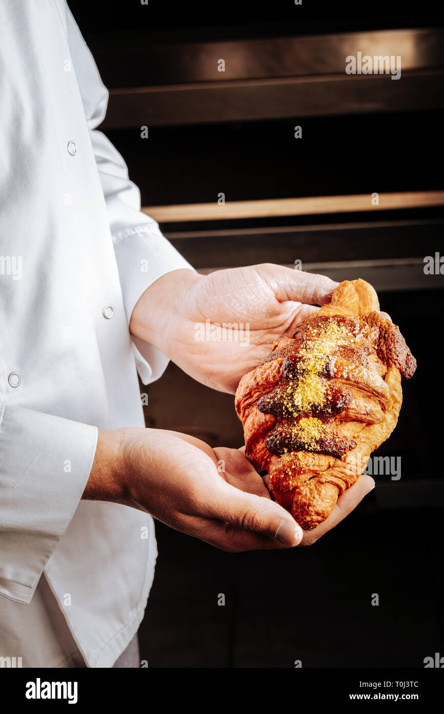 Nice yummy croissant with chocolate and orange peel Stock Photo - Alamy