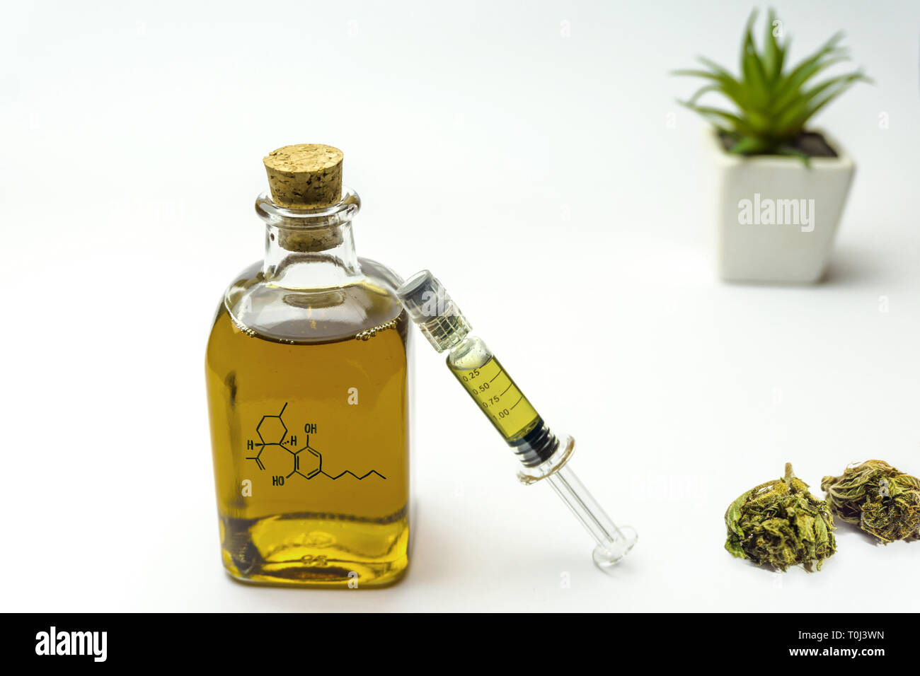 Cbd oil in glass bottle with molecule drawing, syringe, and hemp flower ...