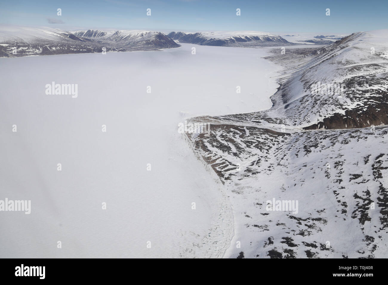 Aerial view of Arctic landscape with frozen fjord and mountains Stock ...