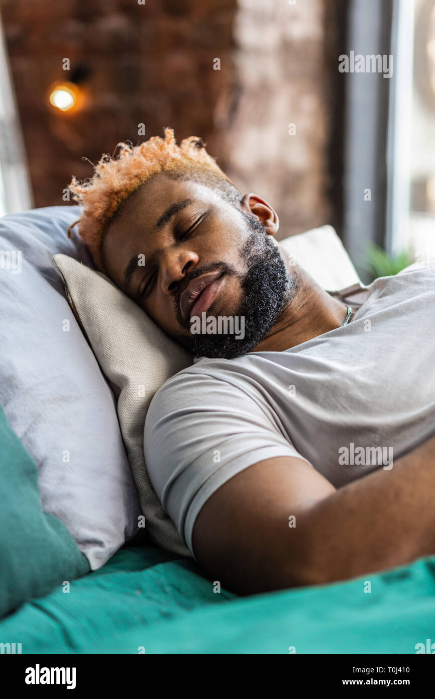 Face of a nice handsome sleeping man Stock Photo - Alamy
