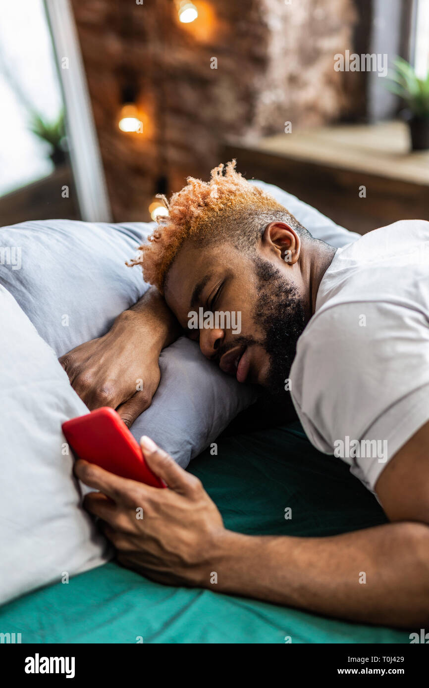 Sleeping african american man hi-res stock photography and images - Alamy
