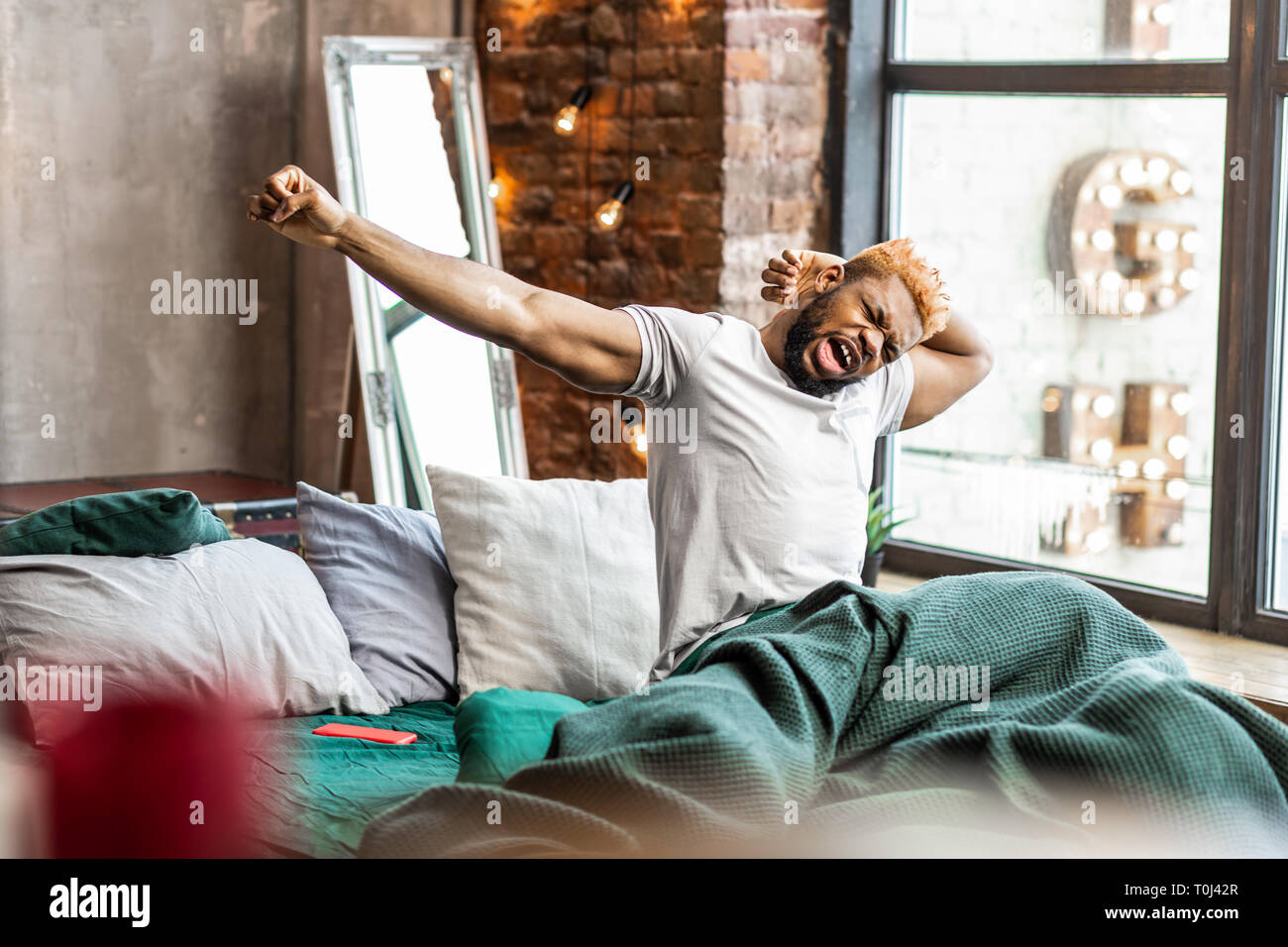 Man waking up hi-res stock photography and images - Alamy