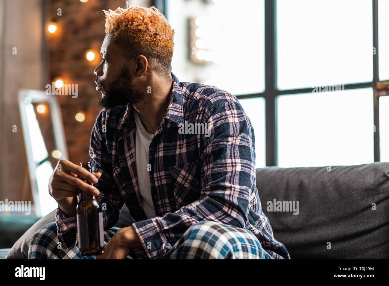 Good looking young man wearing his pyjamas Stock Photo - Alamy