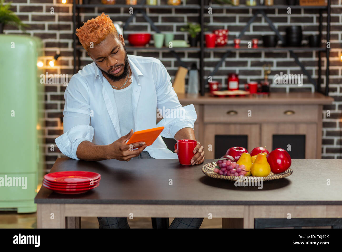 Nice smart man drinking hi-res stock photography and images - Alamy