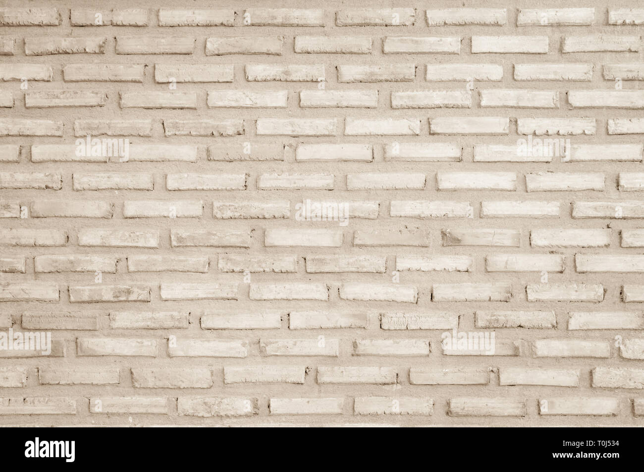 Cream and white brick wall texture background. Brickwork or stonework ...