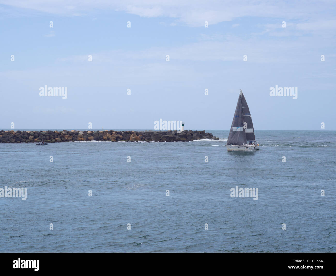 Sailing Boat On The Water By The Spit On The Gold Coast Stock Photo - Alamy