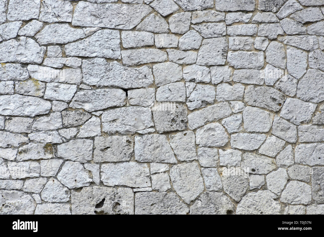 Dry and clean grey pavement or a wall of stone pattern. Close-up and ...