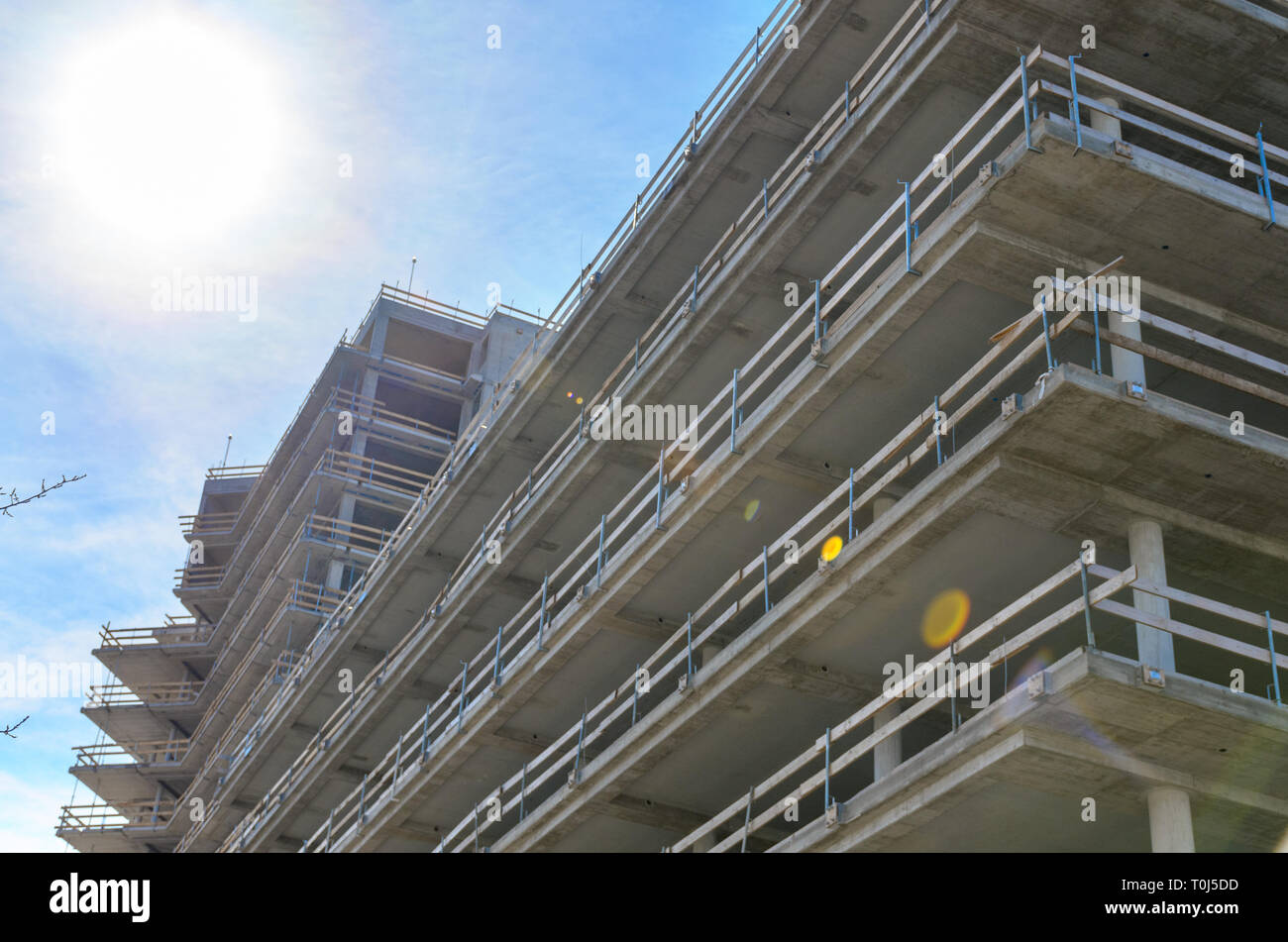 Unfinished concrete multistorey building under construction, with ...