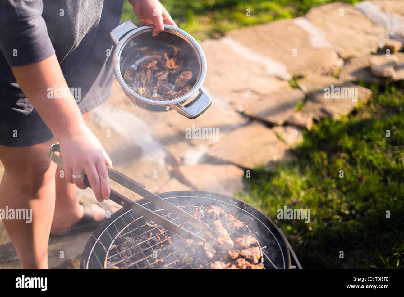 Chicken roasting in hot coals hi-res stock photography and images - Alamy