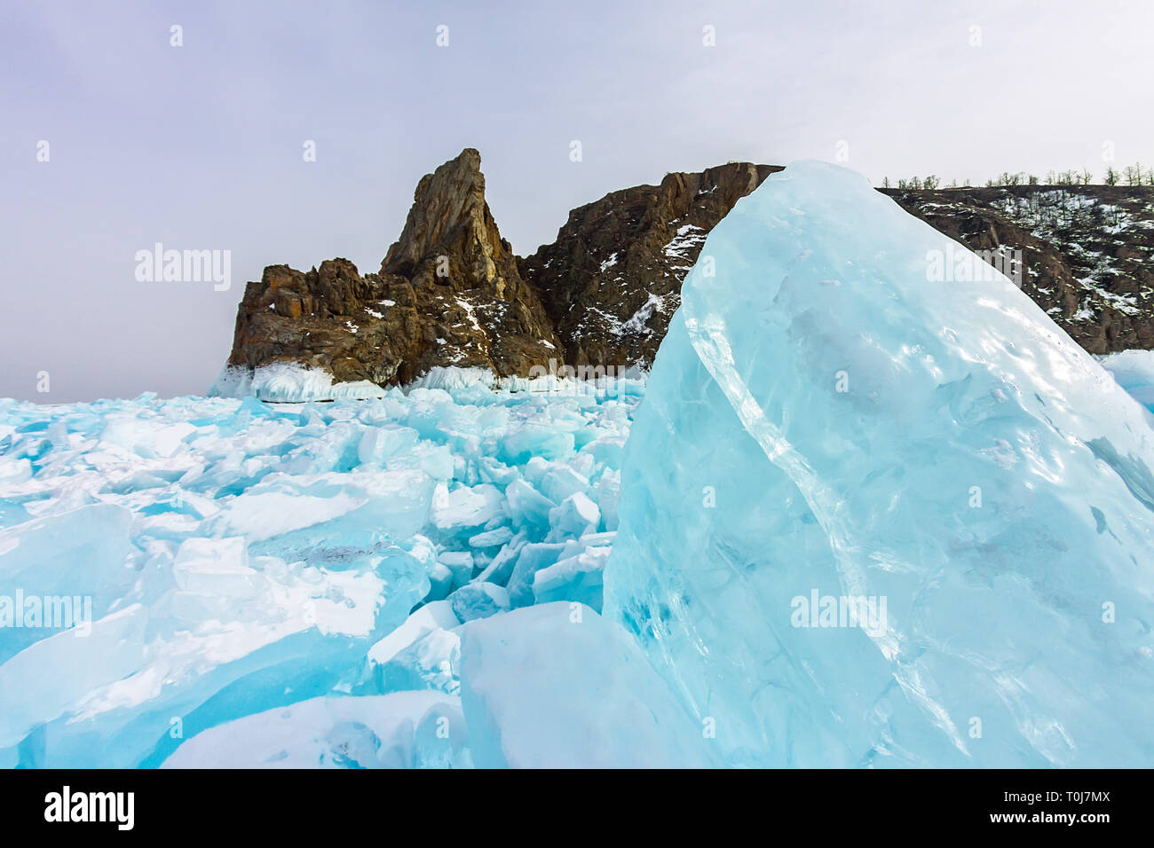 Cape Khoboy rock on Olkhon Island, Lake Baikal, ice hummocks in winter ...