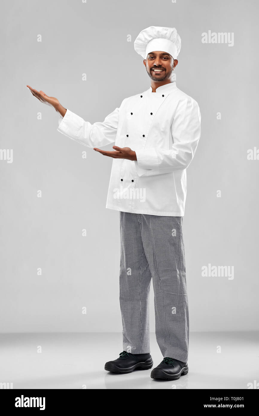 happy male indian chef in toque Stock Photo - Alamy