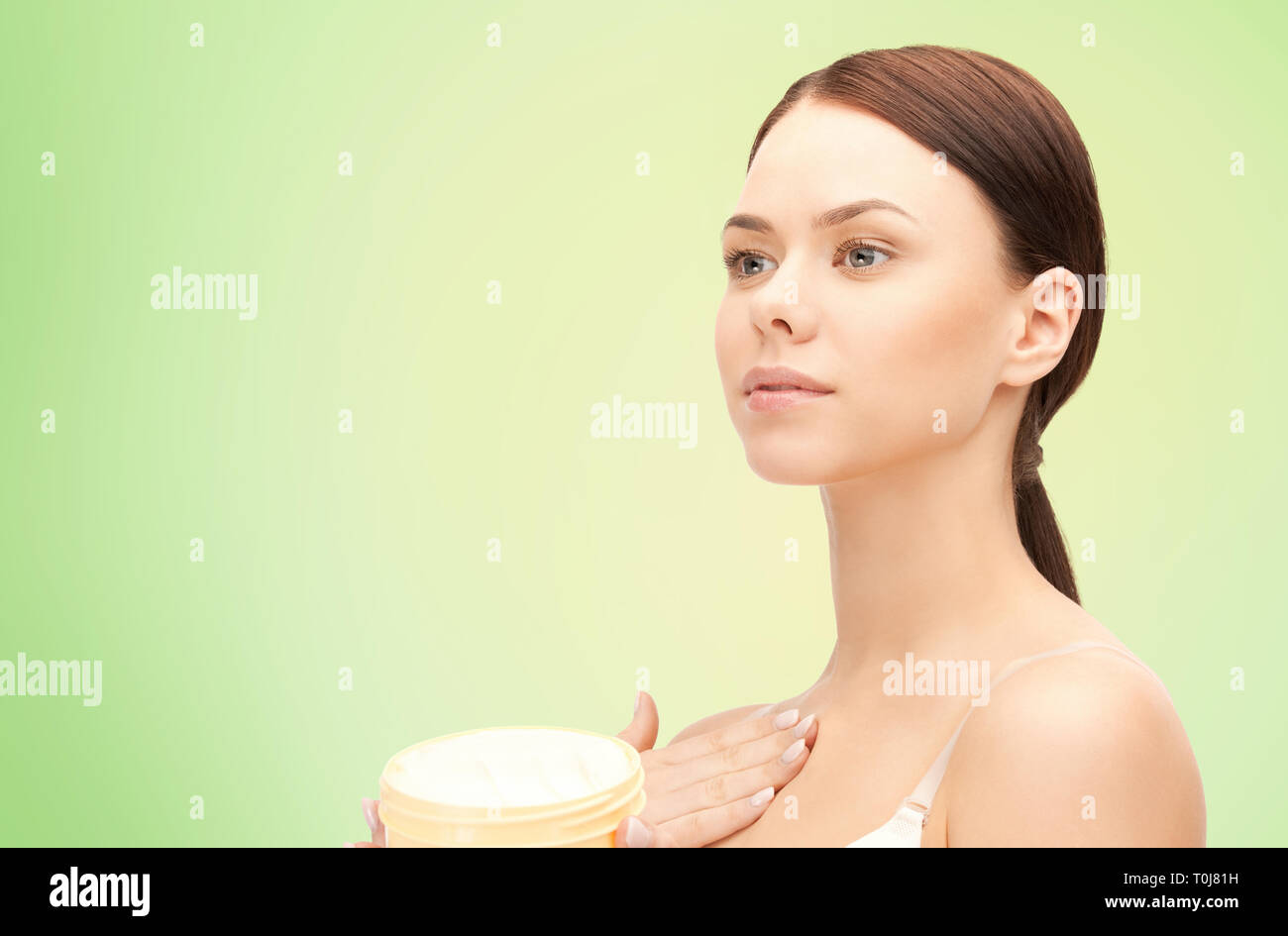 beautiful woman with moisturizing cream Stock Photo - Alamy