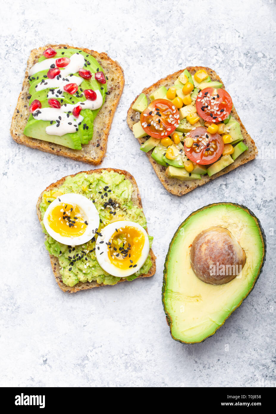 Avocado healthy toasts Stock Photo - Alamy