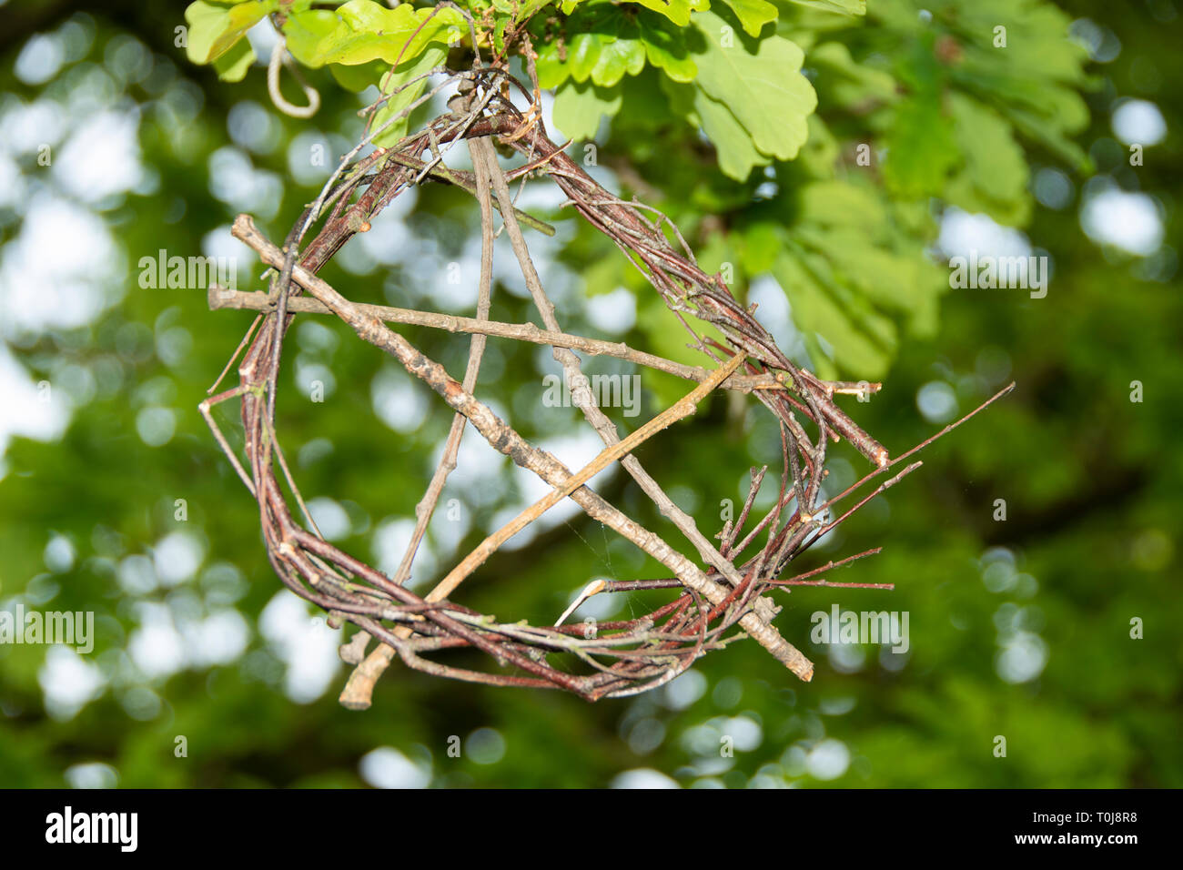 Derbyshire, UK – June 03 2016: Offering tied to a sacred memorial Oak ...