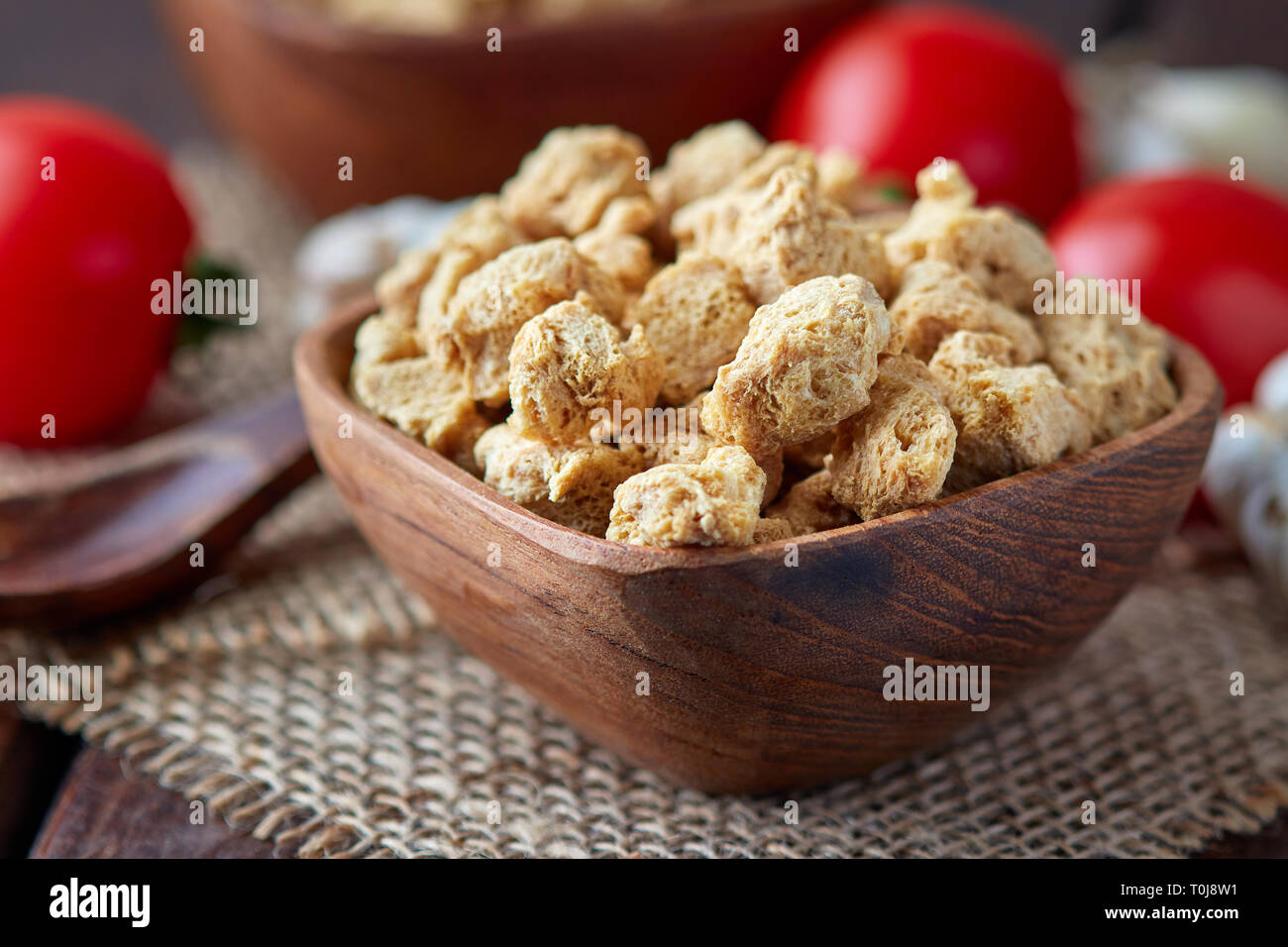 Raw soya chunks, soy meat for vegans in wooden bowl Stock Photo - Alamy