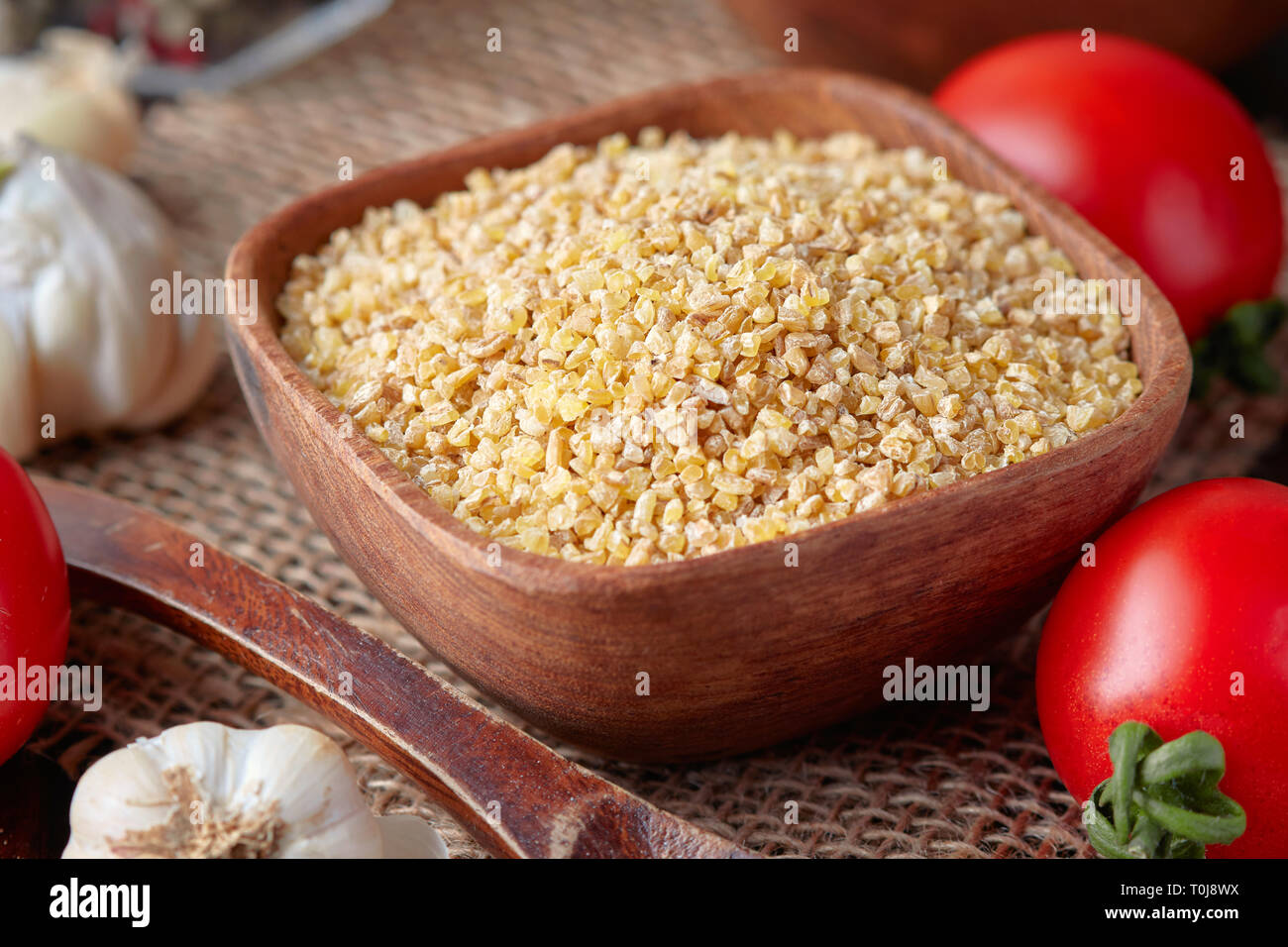 Raw organic bulgur grains hi-res stock photography and images - Alamy