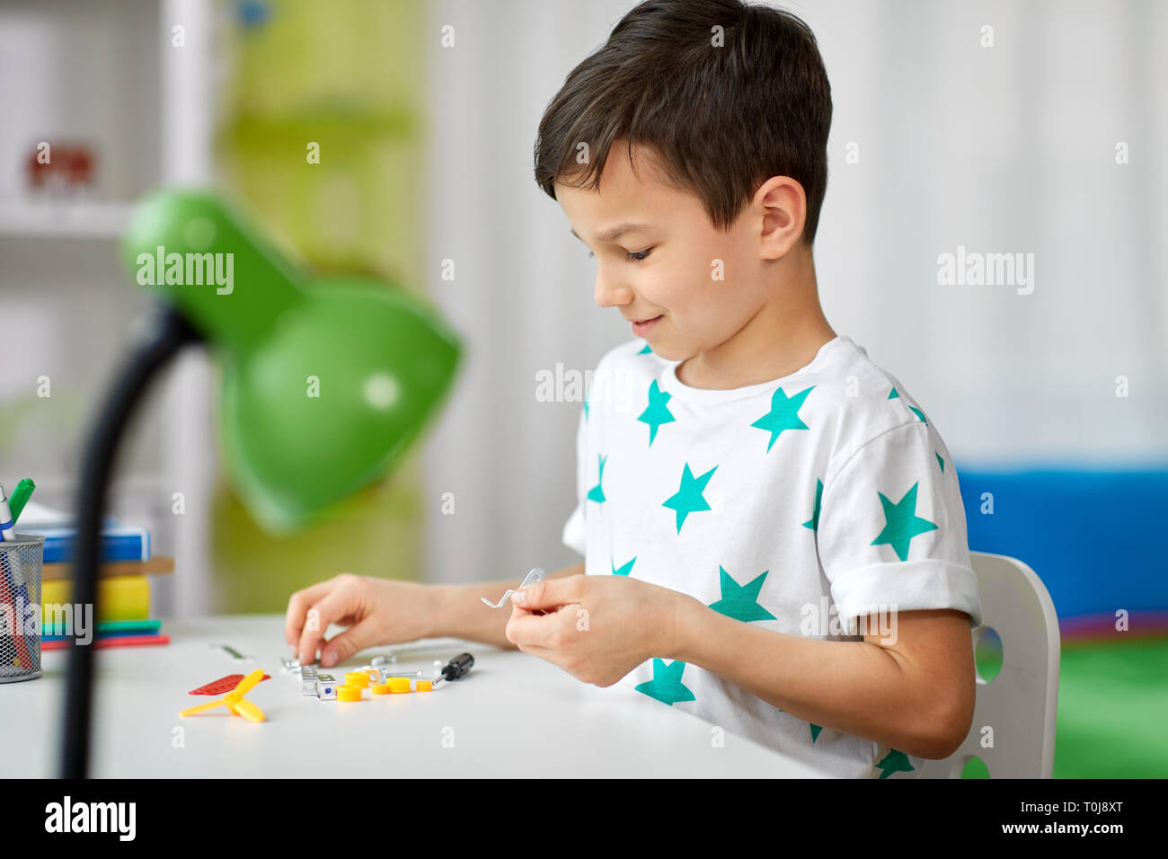 Boy building invention hi-res stock photography and images - Alamy