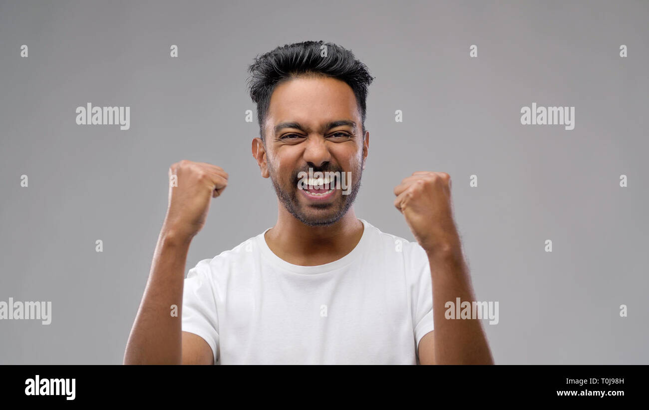 indian man celebrating victory Stock Photo - Alamy