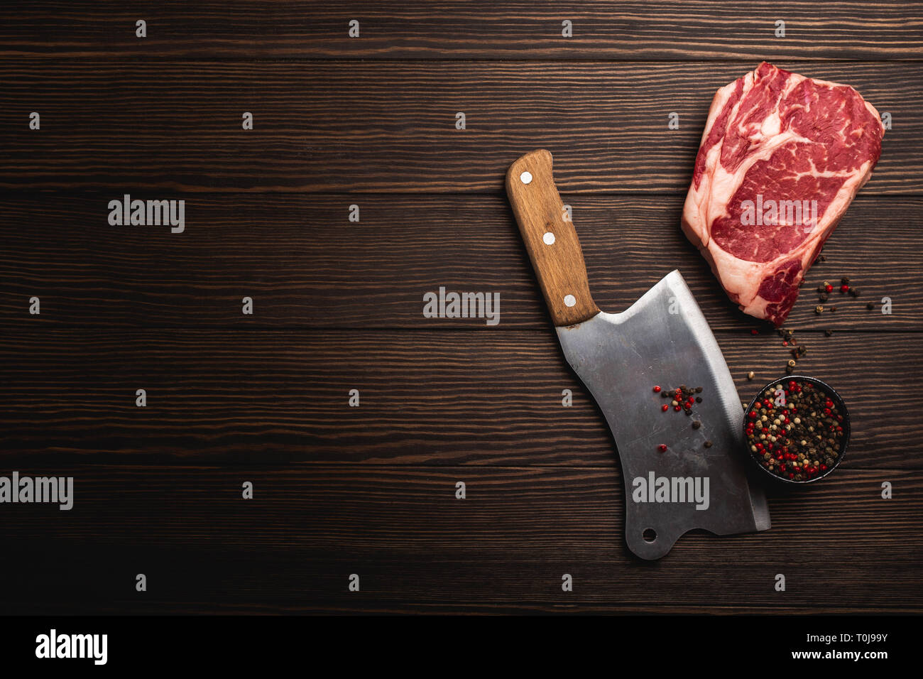 Ribeye and meat cleaver Stock Photo - Alamy