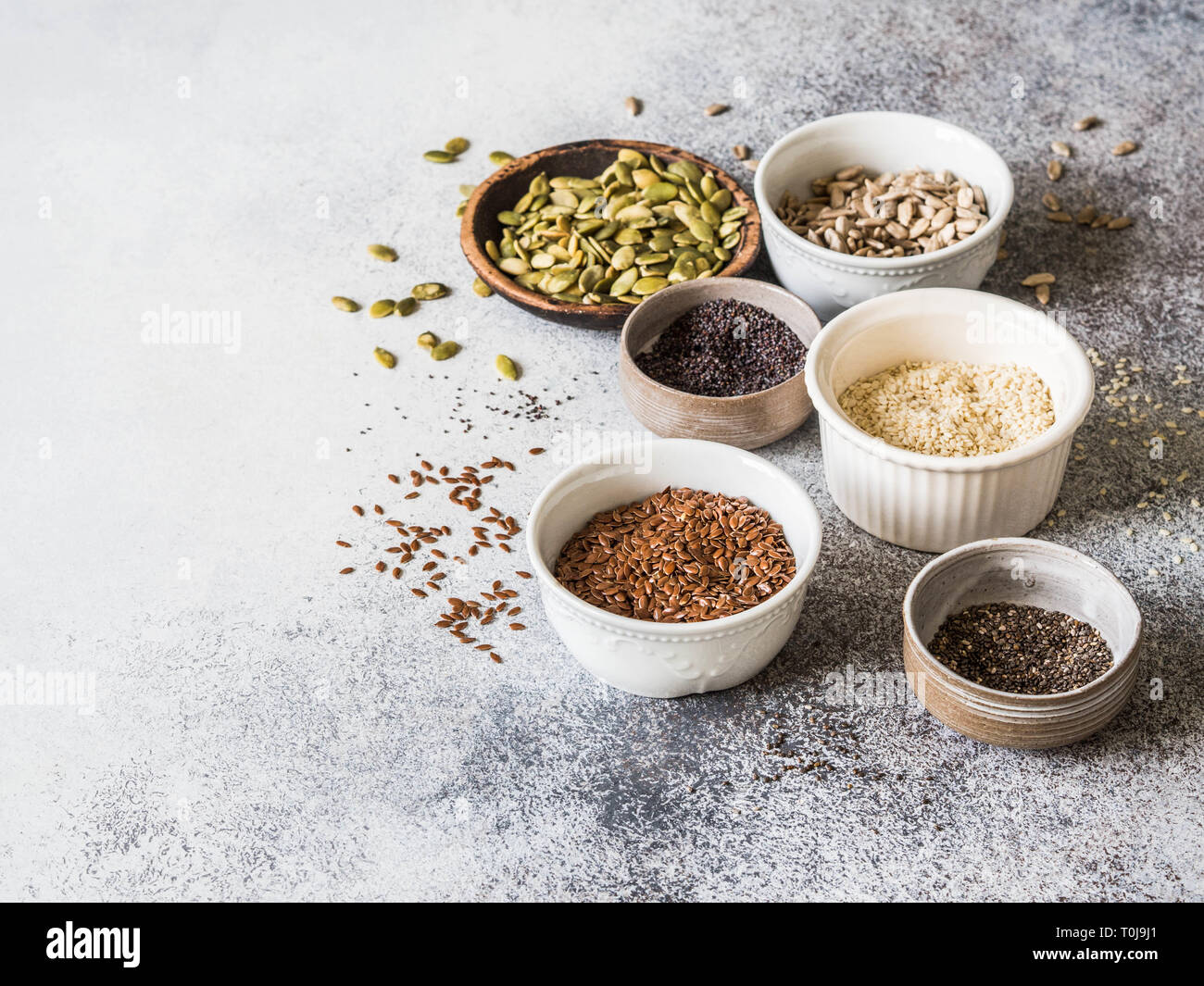 Various seeds - sesame, flax seed, sunflower seeds, pumpkin seed, poppy ...