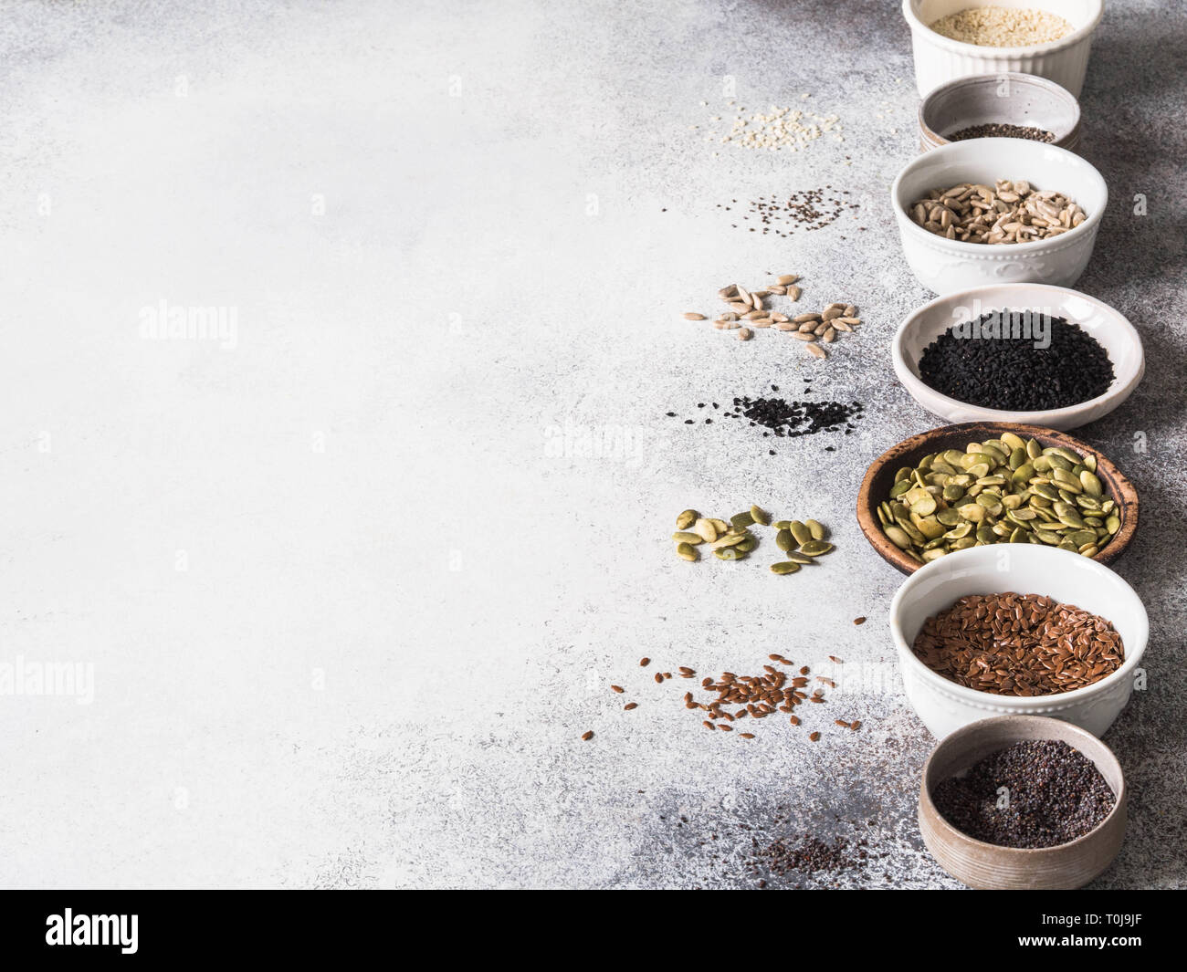 Various seeds - sesame, flax seed, sunflower seeds, pumpkin seed, poppy ...