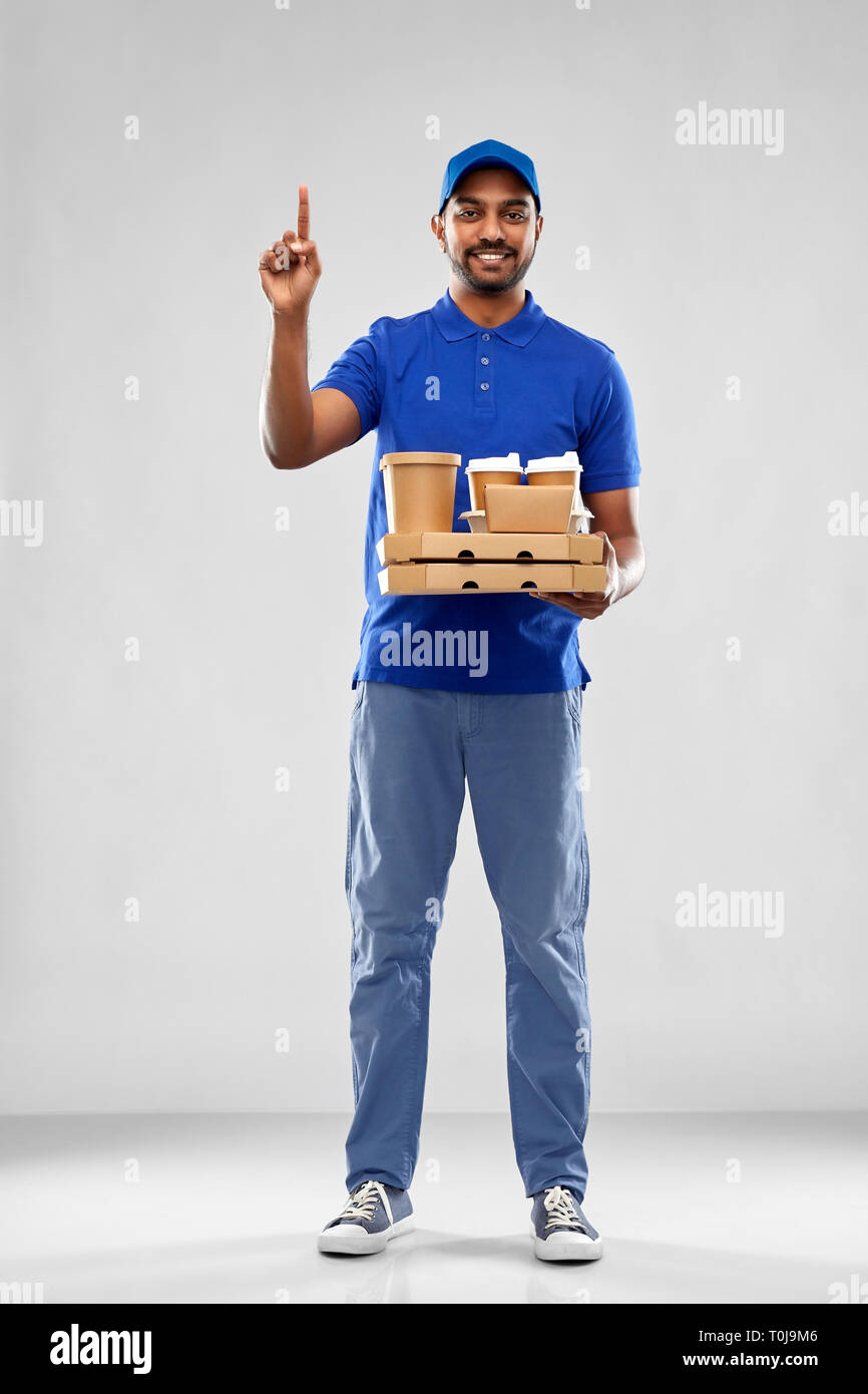 happy indian delivery man with food and drinks Stock Photo - Alamy