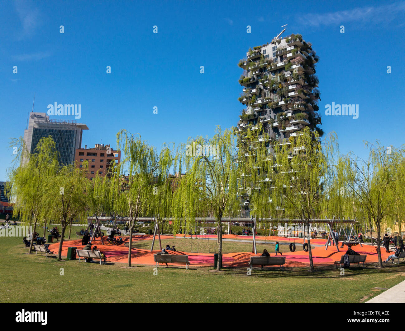 Library of Trees, relaxation area with benches and swings. People on a ...