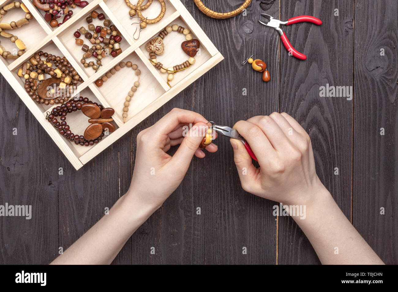 Girl hobby making bracelet hi-res stock photography and images - Alamy