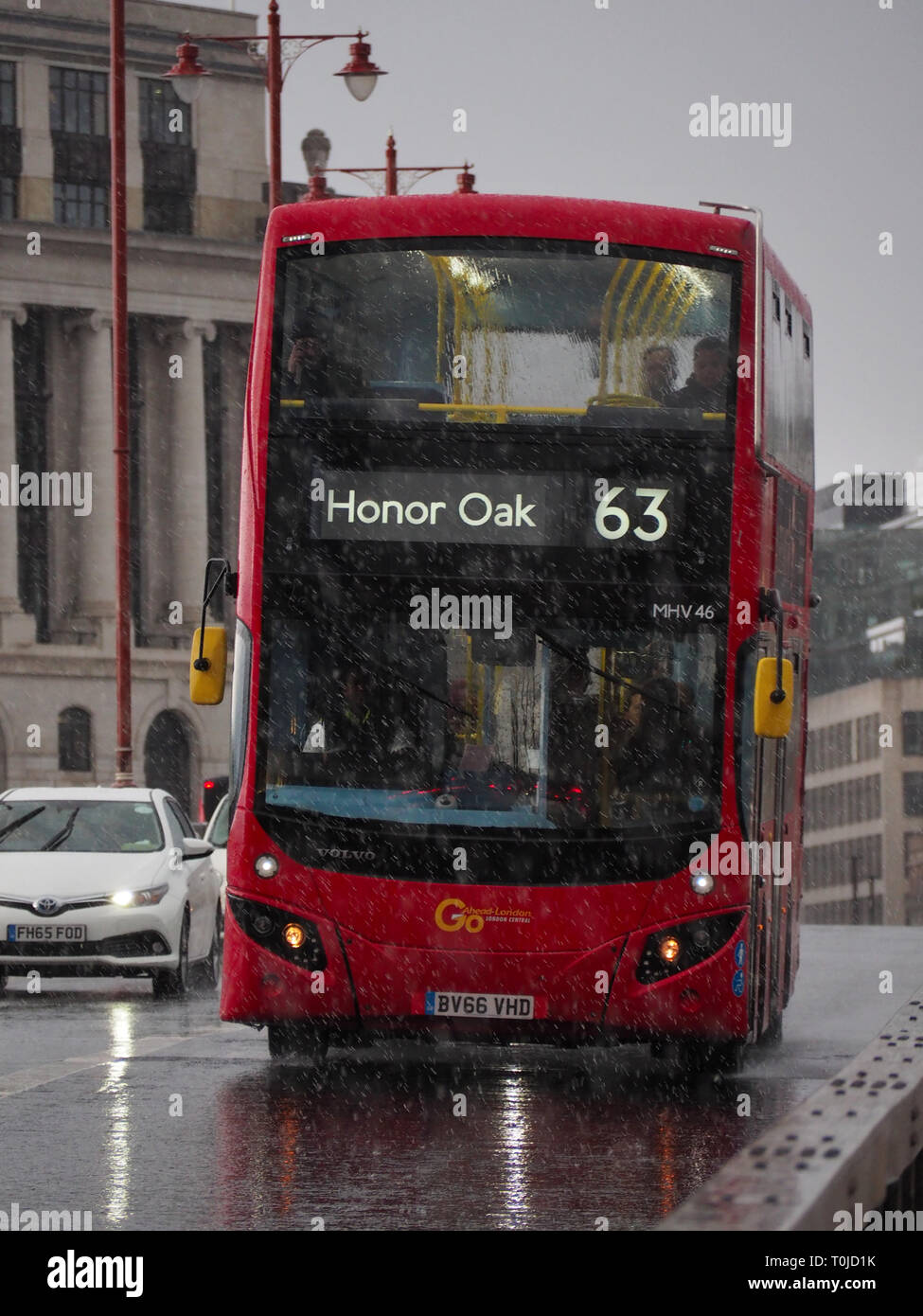 Bus travel during wet weather in London, England, UK Stock Photo - Alamy
