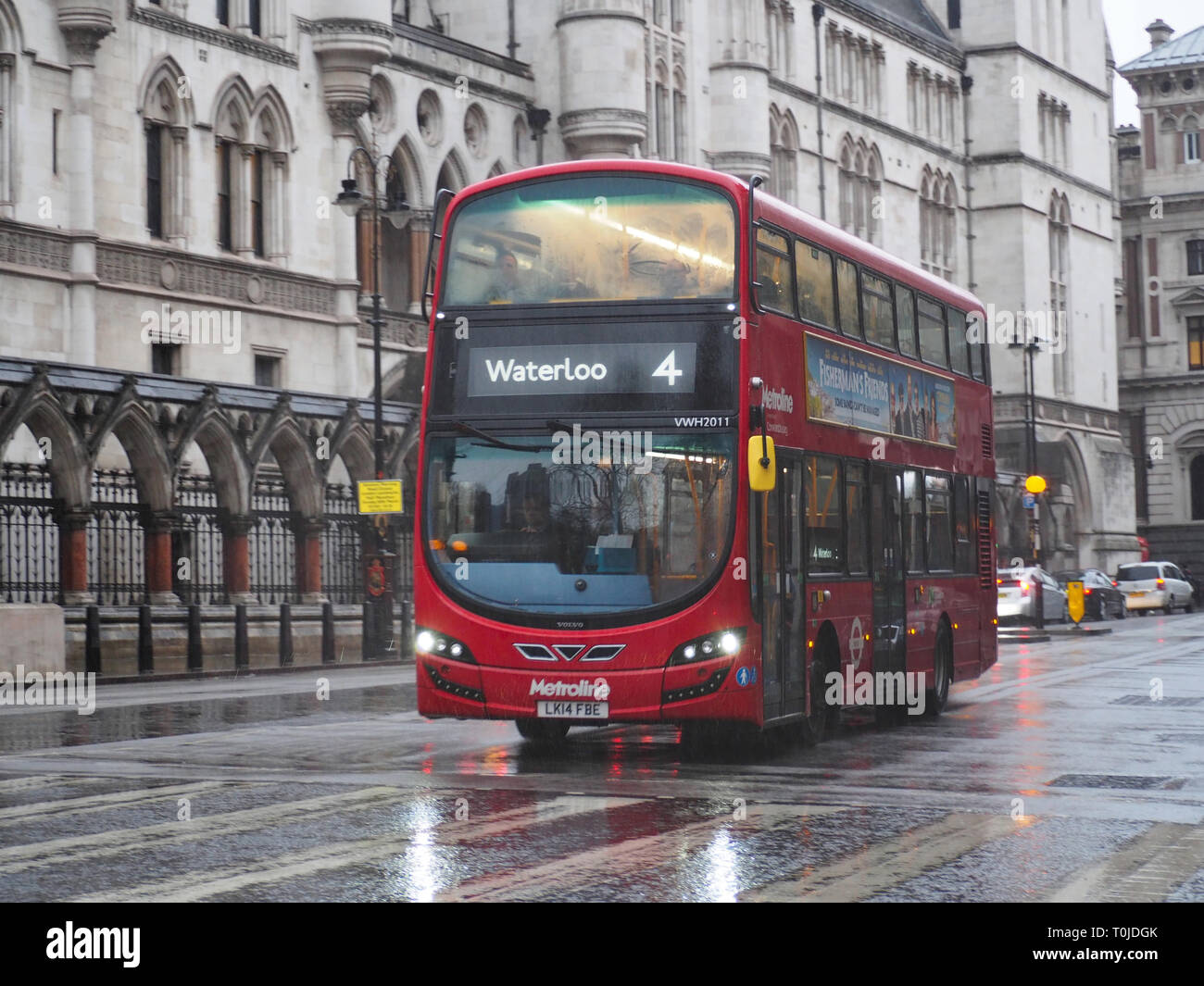 Bus travel during wet weather in London, England, UK Stock Photo - Alamy