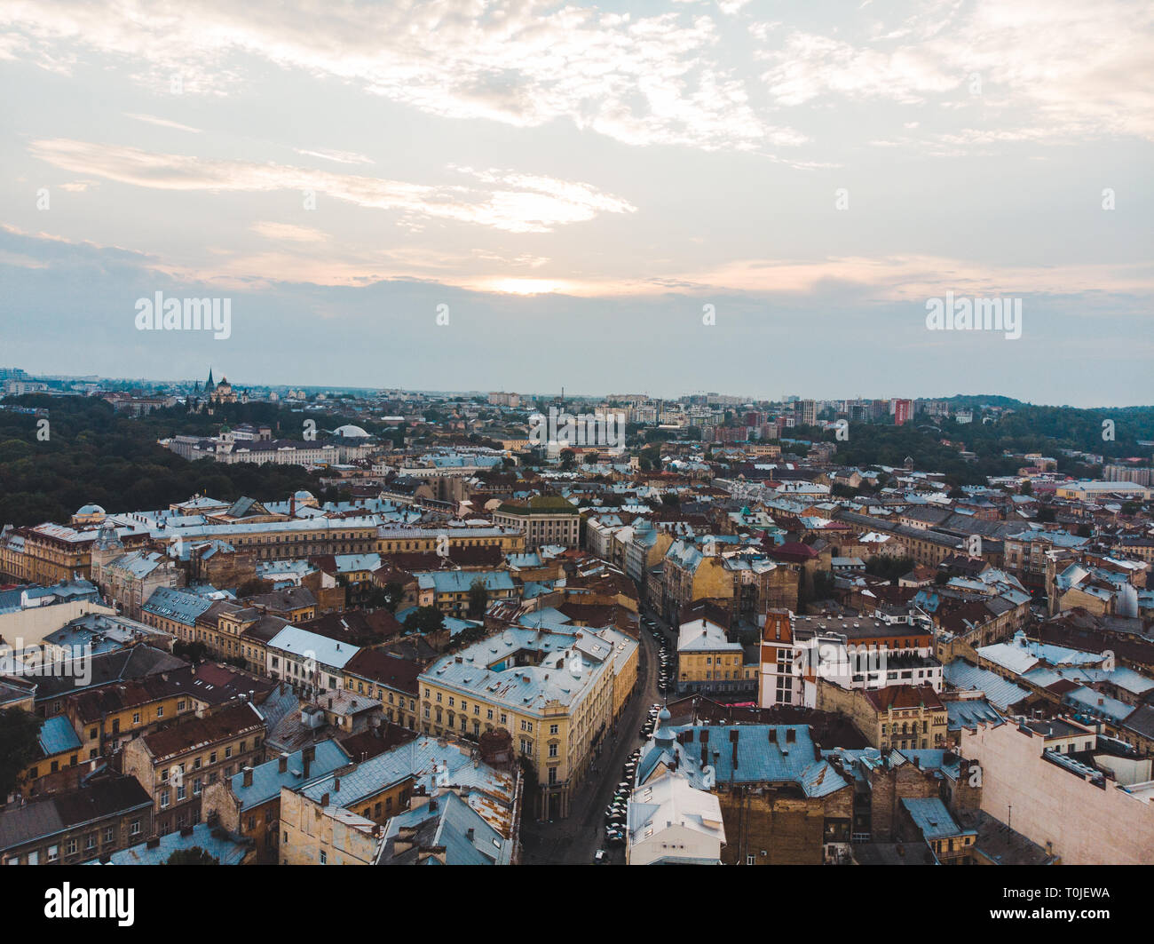 aerial view of old european city on sunset. clouds on horizon Stock ...