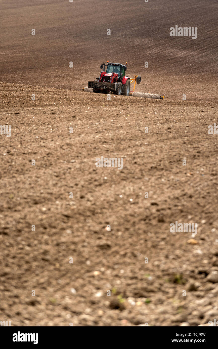A farmer preparing his land for spring planting Stock Photo - Alamy