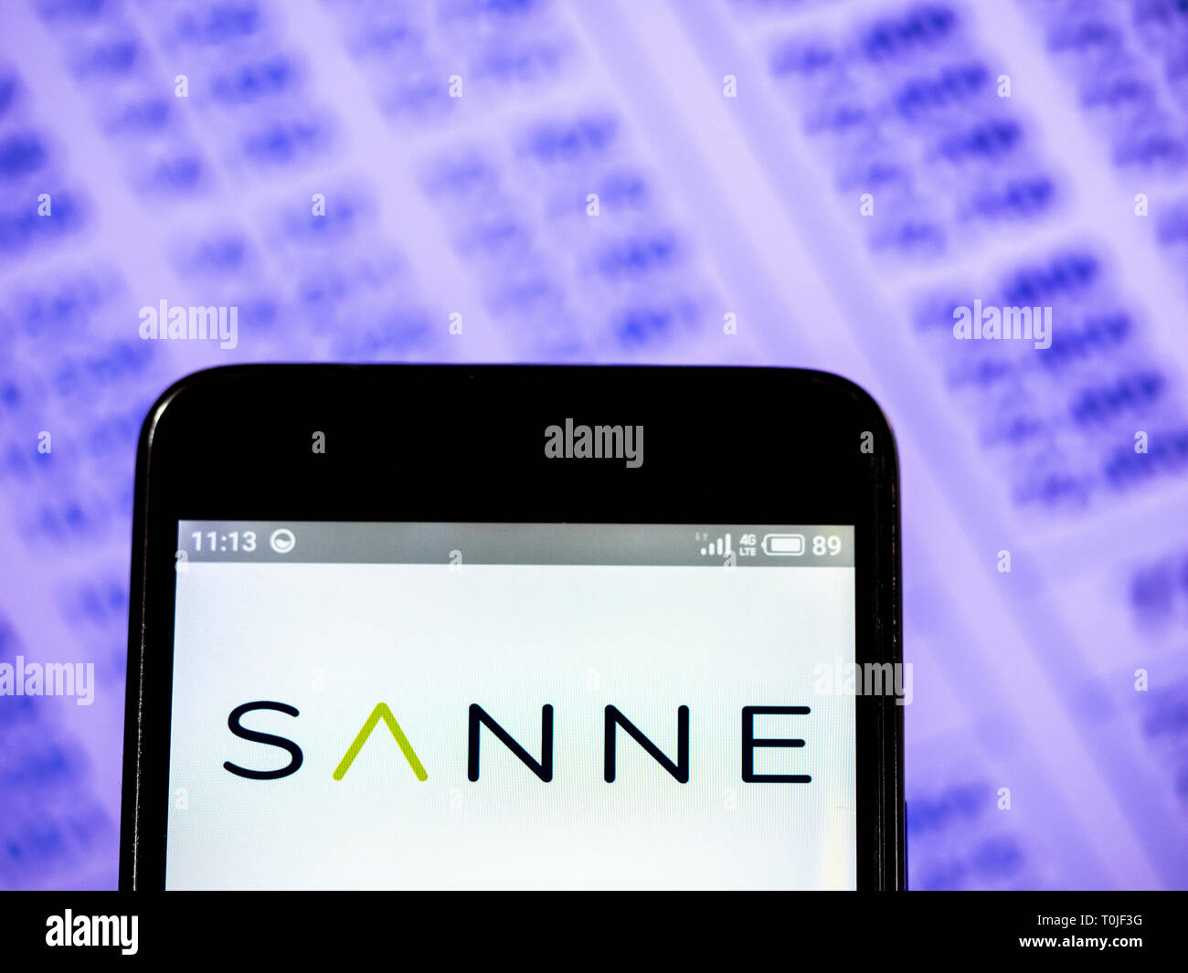 Sanne Group logo seen displayed on smart phone Stock Photo - Alamy
