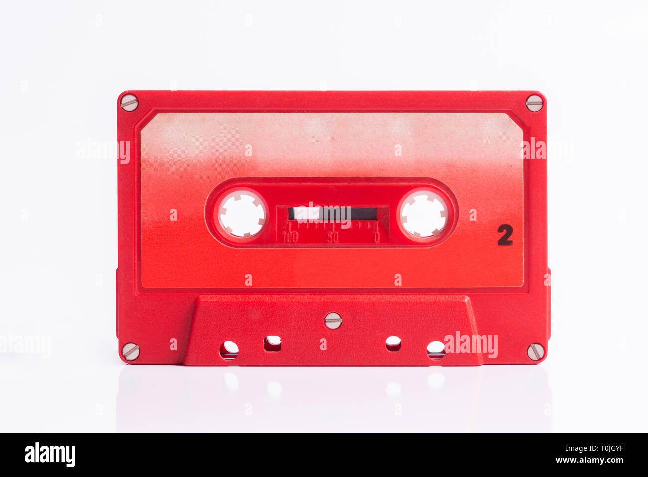 Audio Cassete Red on white background Stock Photo - Alamy