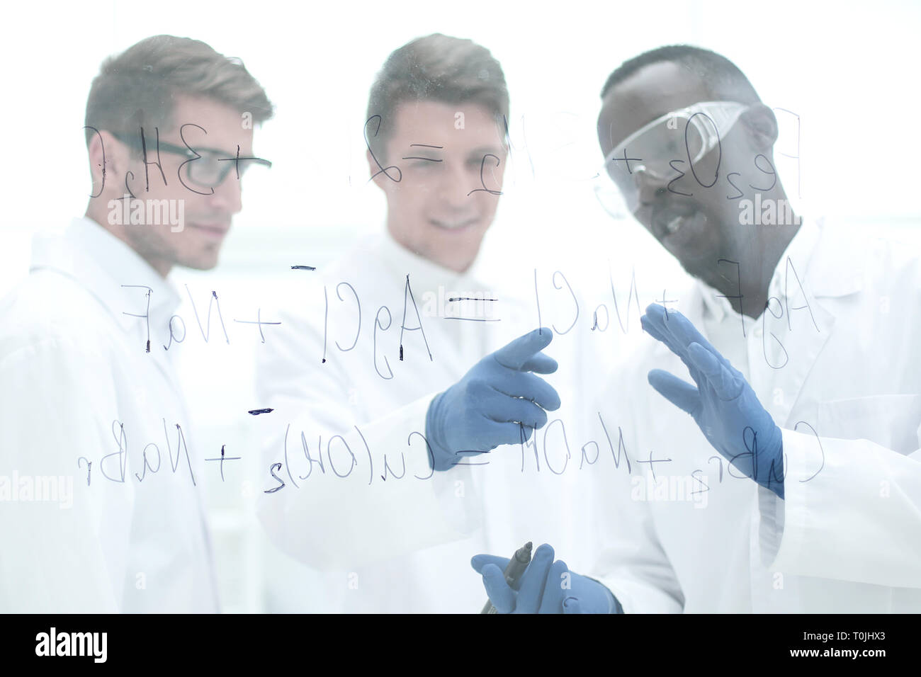 Scientists talk hi-res stock photography and images - Alamy