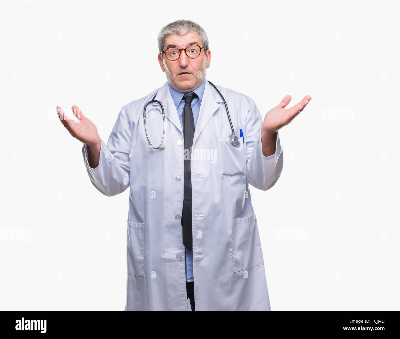 Handsome senior doctor man over isolated background clueless and ...