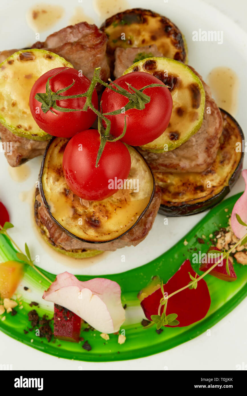 Roasted vegetables and meat Stock Photo - Alamy