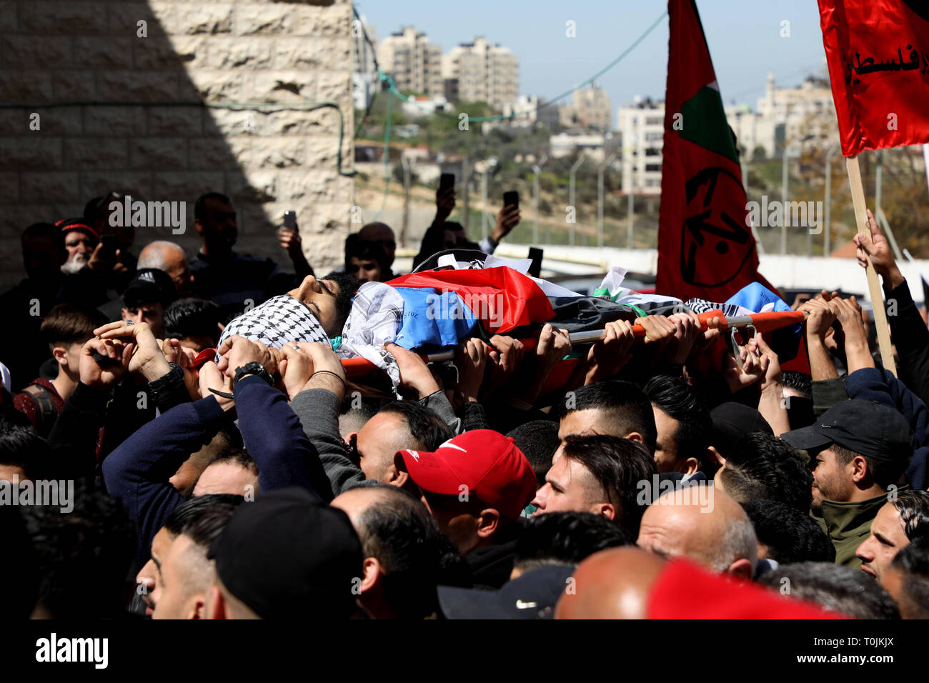 March 20, 2019 - Nablus, Palestine, 20th March 2019. Mourners carry the ...