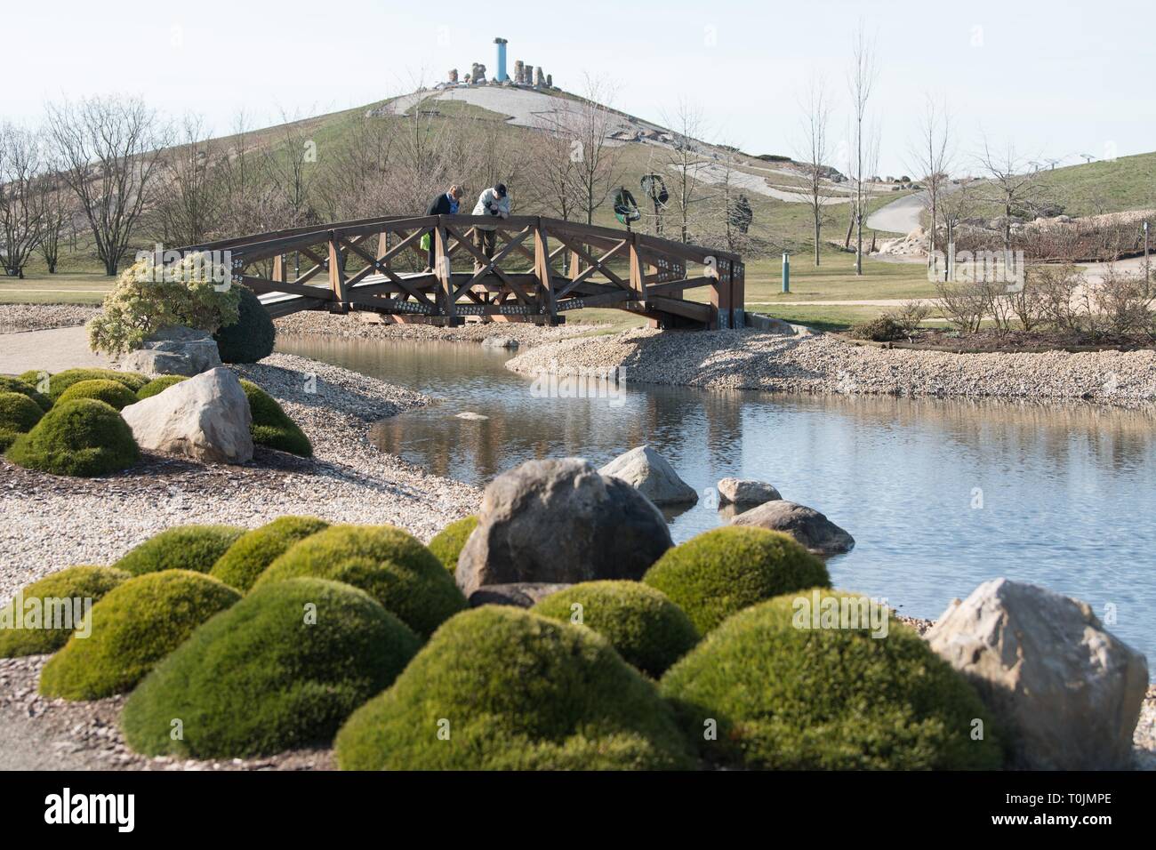 Boxberg, Germany. 20th Mar, 2019. Visitors are standing on a wooden ...