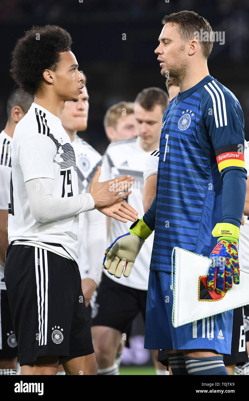 Wolfsburg, Deutschland. 20th Mar, 2019. Leroy Sane (Germany) and ...