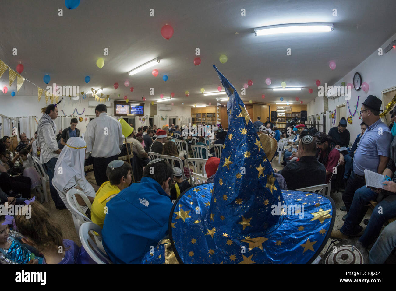 Elkana, Israel. 20th Mar, 2019. People and kids in a synagogue in the ...