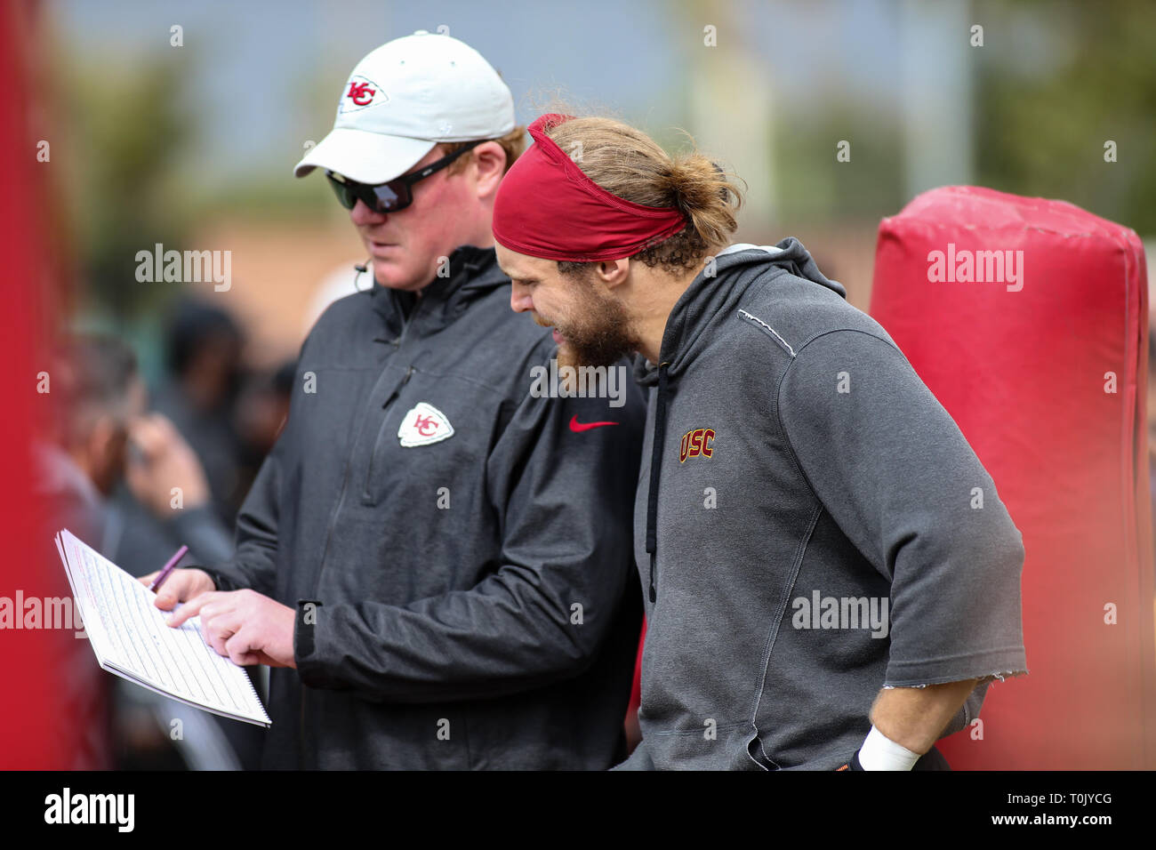 USC Trojans linebacker Porter Gustin (45) with Kansas City scout during ...