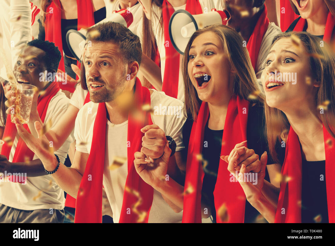 Group of happy fans are cheering for their team victory Stock Photo - Alamy