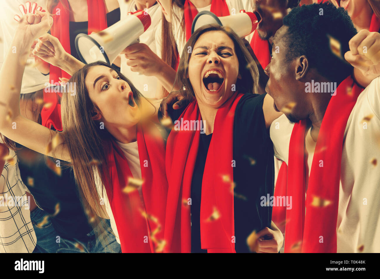 Group of happy fans are cheering for their team victory Stock Photo - Alamy