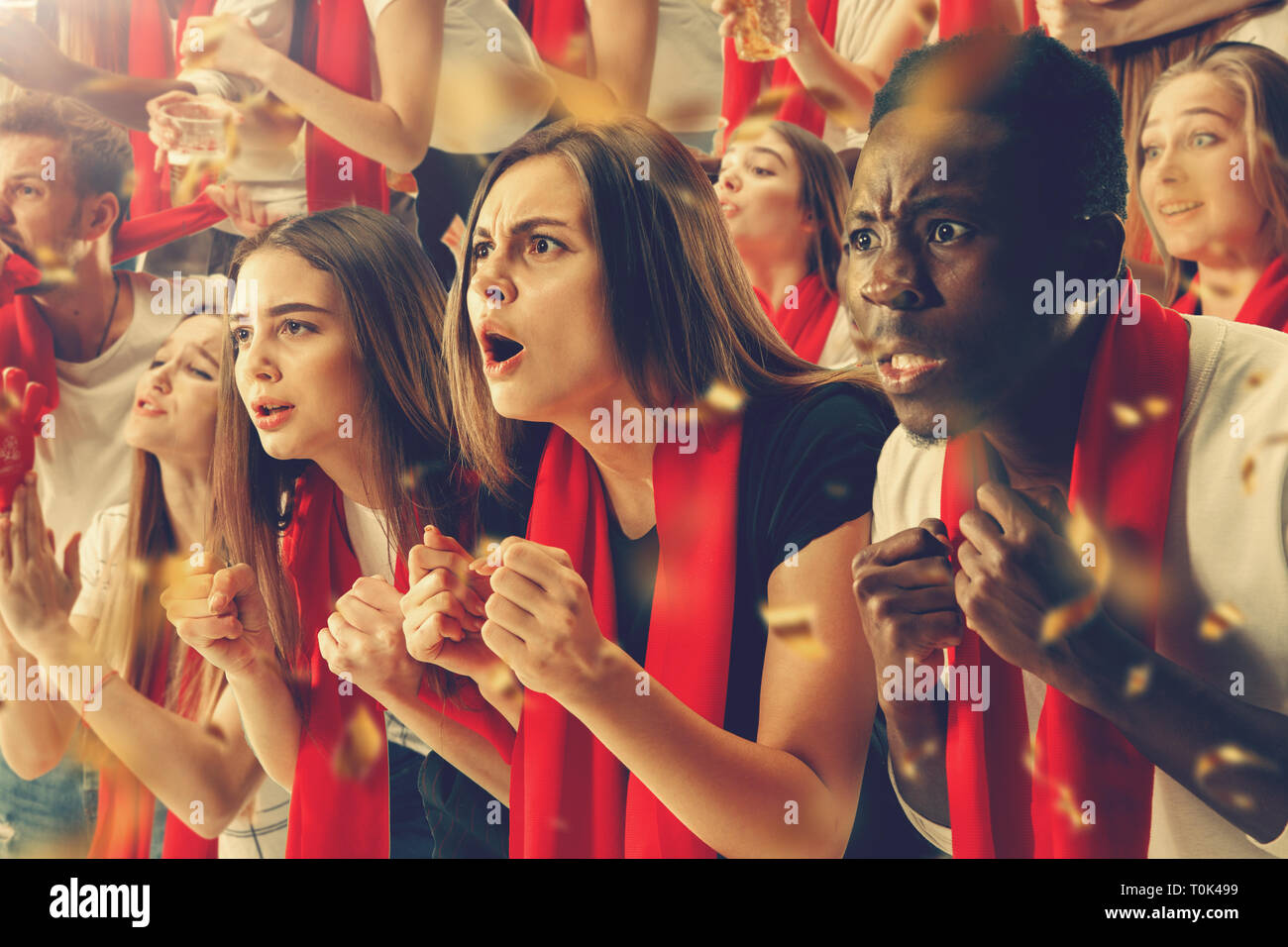 Group of happy fans are cheering for their team victory Stock Photo - Alamy